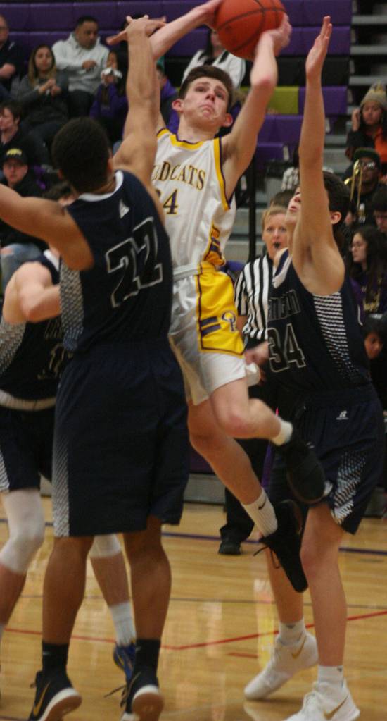 Arlington holds off hard-charging Oak Harbor / Boys basketball ...